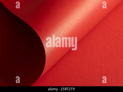 Fiery crimson paper background with a pearlescent, glossy texture and ...