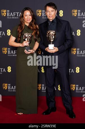 Sean Baker, winner of the award for best film editing for "Anora," poses in the press room at ...