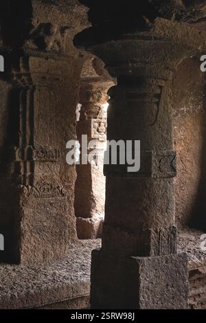 Sculptured pillars in cave number nineteen in Panhale Kazi caves ...