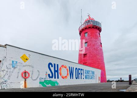 Iconic red Poolbeg Lighthouse on River Liffey, near Poolbeg in Dublin ...