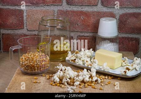 Kitchen scene with butter, salt, oil and popcorn Stock Photo - Alamy