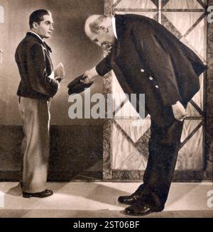 MY SONG GOES ROUND THE WORLD JOSEPH SCHMIDT (left) as the singer ...
