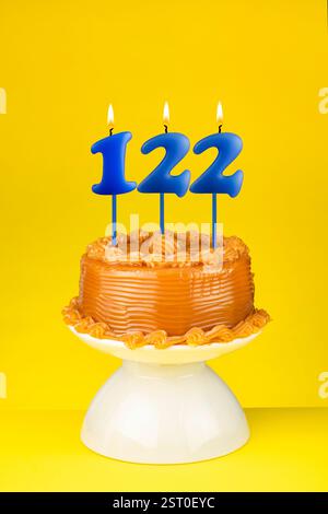 Birthday Cake With Candle Number 122 - On Green Background Stock Photo ...