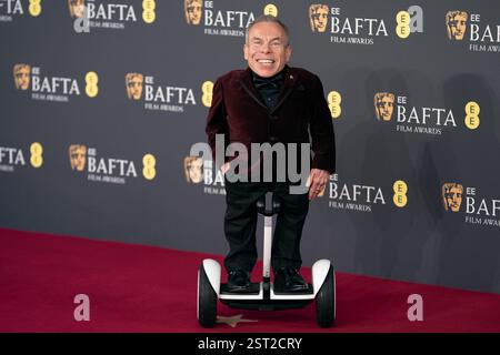 Warwick Davis attends the 2025 EE BAFTA Film Awards at The Royal ...
