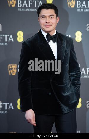 Henry Golding attends the 2025 EE BAFTA Film Awards at The Royal ...