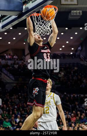 Louisville forward Noah Waterman (93) backs into the lane against ...
