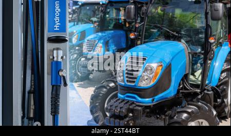 Hydrogen fuel cell agricultural tractors. Concept Stock Photo - Alamy