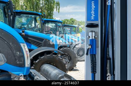 Hydrogen fuel cell agricultural tractors. Concept Stock Photo - Alamy