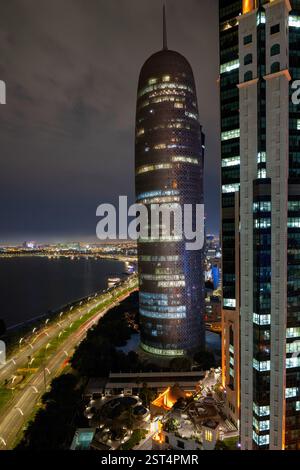 Night aerial view of Burj Doha . Iconic Doha Tower Stock Photo - Alamy