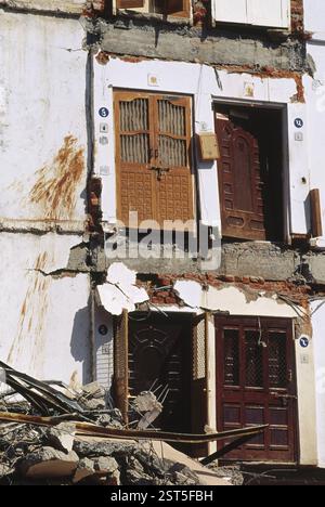 Gujarat Earthquake damage apartment building collapsed ; Ahmedabad ...