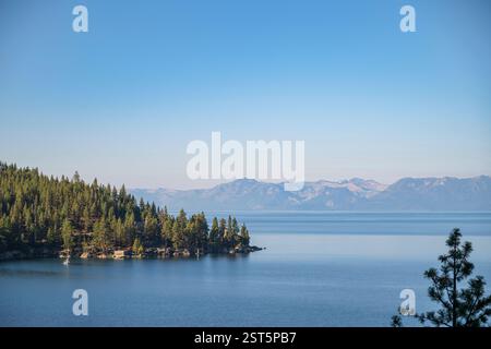 View of the stunning, wooded shoreline of Lake Tahoe, California, on a ...