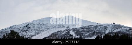 A beautiful northern city Narvik with snowy mountains over the fjord ...
