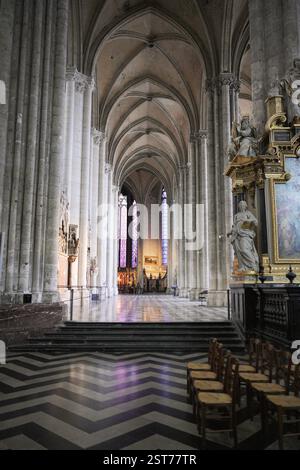 View of Amiens Cathedral showcasing vibrant stained glass windows ...