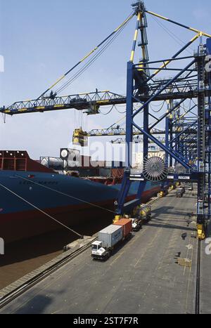 Containers loading at port, nava seva, india Stock Photo - Alamy