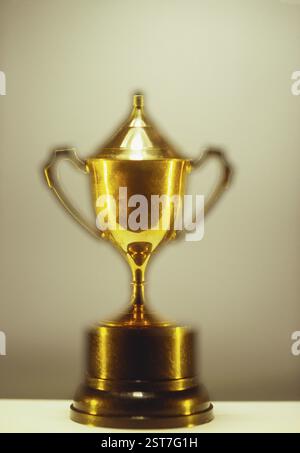 Award winning and championship concept, trophy cup on sport background ...