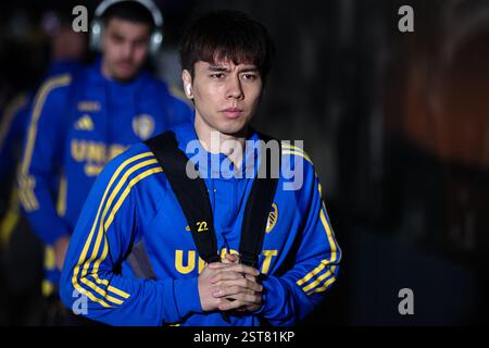 Ao Tanaka of Leeds United arrives ahead of during the Premier League ...