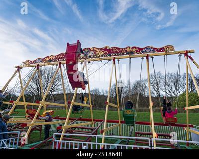 Traditional funfair ride the shuggy or swing boat, UK Stock Photo - Alamy