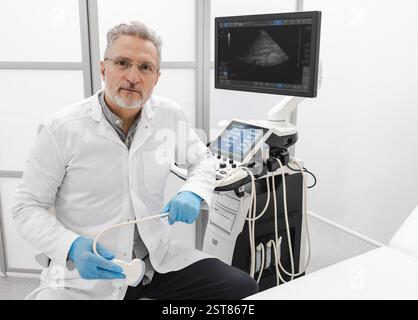 Ultrasonic examination of internal organs. A man on an abdominal ...