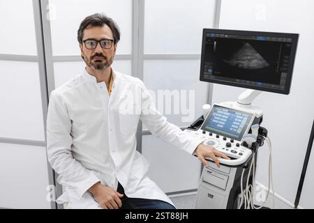 Ultrasonic examination of internal organs. A man on an abdominal ...