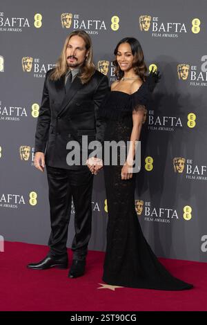 Zoe Saldana and Marco Perego attend the premiere of 'Mission Impossible ...