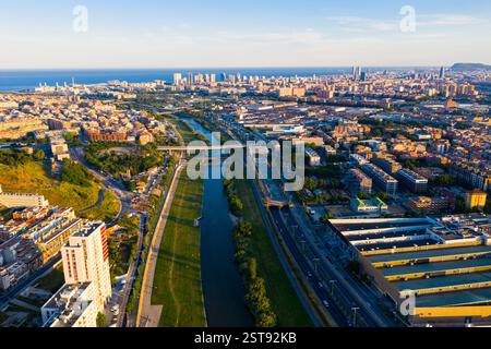 Aerial view of Sant Adria de Besos and Barcelona on Besos river, Spain ...