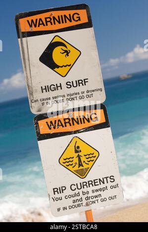 Surf and Currents Warning Sign on a beach in Hawaii Stock Photo - Alamy