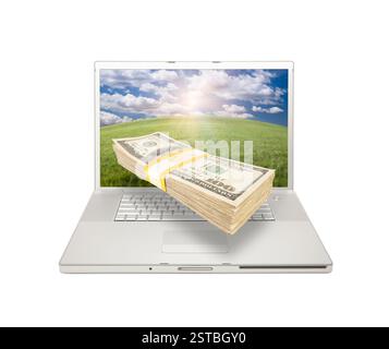 Dollar bills on the white computer keyboard - online payments concept ...