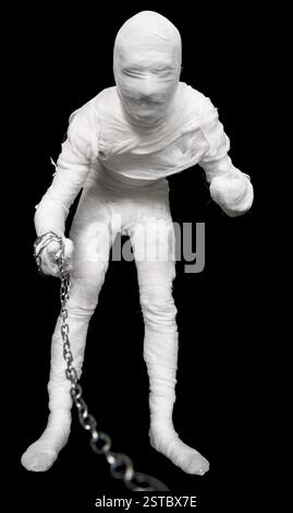 Man in costume mummy with chain Stock Photo - Alamy