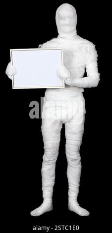 Mummy with blank frame on the black background Stock Photo - Alamy