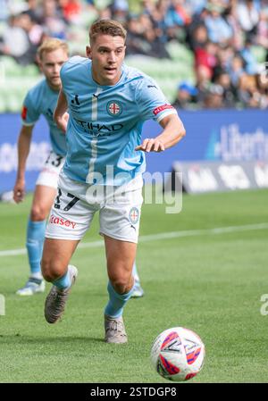 Max Caputo of Melbourne City seen celebrating with a trophy after ...