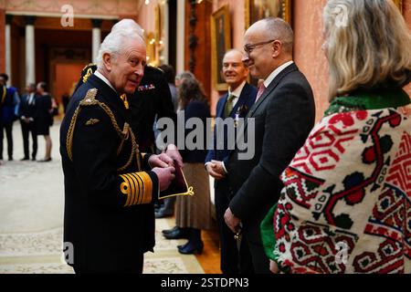 King Charles III presents the Humanitarian Medal to Stuart Kinsey ...