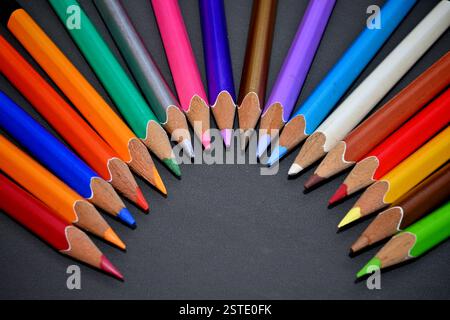 Arrange the color pencils in a half of circle Stock Photo - Alamy