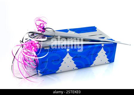 Luxury wrapped blue present for christmas Stock Photo - Alamy