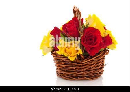 red and yellow roses in a basket Stock Photo - Alamy
