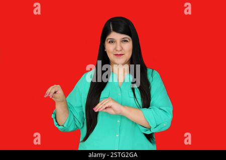 Latina adult woman uses Mexican Sign Language as a person with a ...
