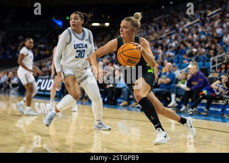 Michigan State guard Theryn Hallock shoots against USC guard Avery ...