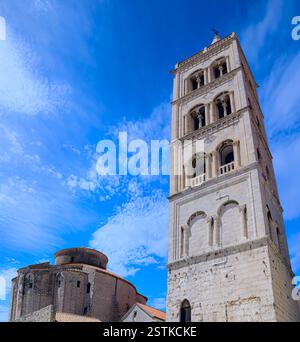 Catholic church of St Anastasia with bell tower, and water well in ...