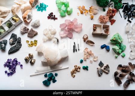 Collection of beautiful precious stones on white table, close view ...