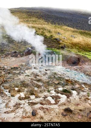 This captivating stock photo captures a geothermal landscape featuring ...