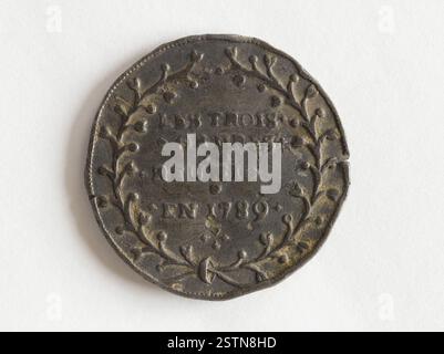 A 1789 coin featuring a peasant of the Third Estate bearing the kingdom ...