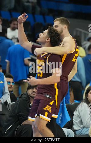 Minnesota forward Parker Fox (23) shoots against Wisconsin forward ...