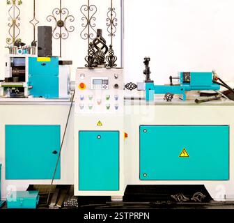 Automatic machine for iron work ornaments production Stock Photo - Alamy