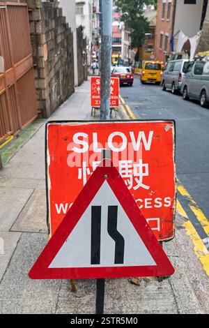Slow Narrow Sign Stock Photo - Alamy