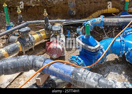 Water Supply Underground Pipes and Valves Installation Stock Photo - Alamy