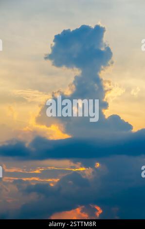 White fluffy cumulonimbus clouds forming before thunderstorm on summer ...