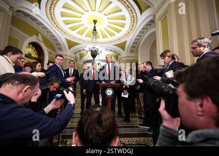 Senate Majority Leader John Thune (R-S.D.) speaks with reporters outside his office at the U.S ...