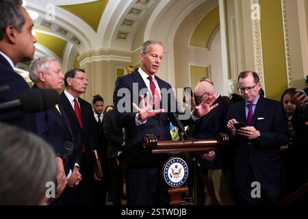 Senate Majority Leader John Thune (R-S.D.) speaks with reporters ...