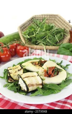 Courgette rolls and stuffed mozzarella Stock Photo - Alamy