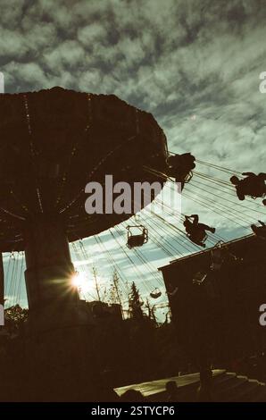 amusement park in Tirana. Trolley parks. Ferris wheels Stock Photo - Alamy