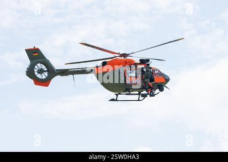 The demonstration flight of light utility helicopter Airbus H145 SAR (Search and Rescue Stock ...